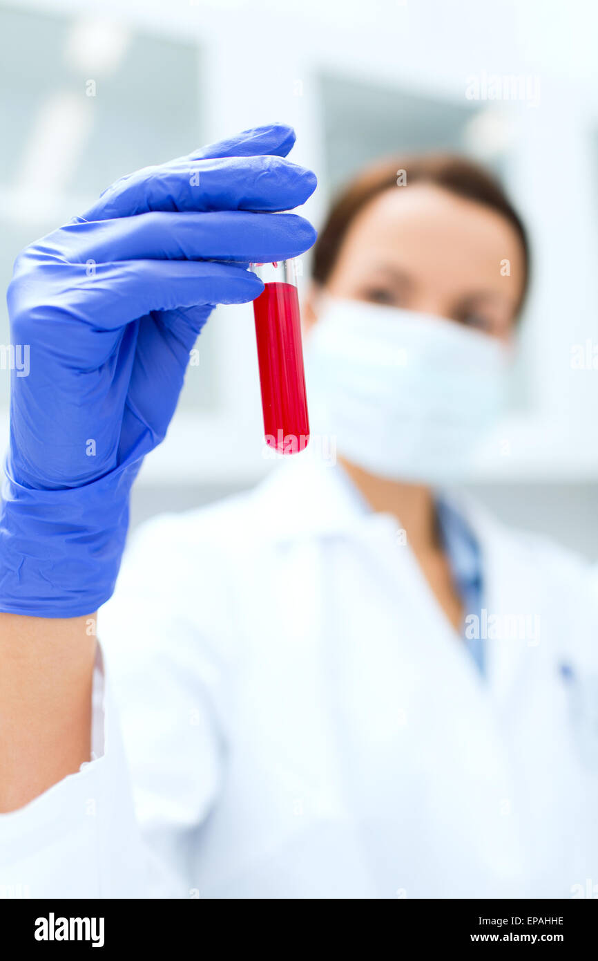 close up of scientist holding test tube in lab Stock Photo - Alamy
