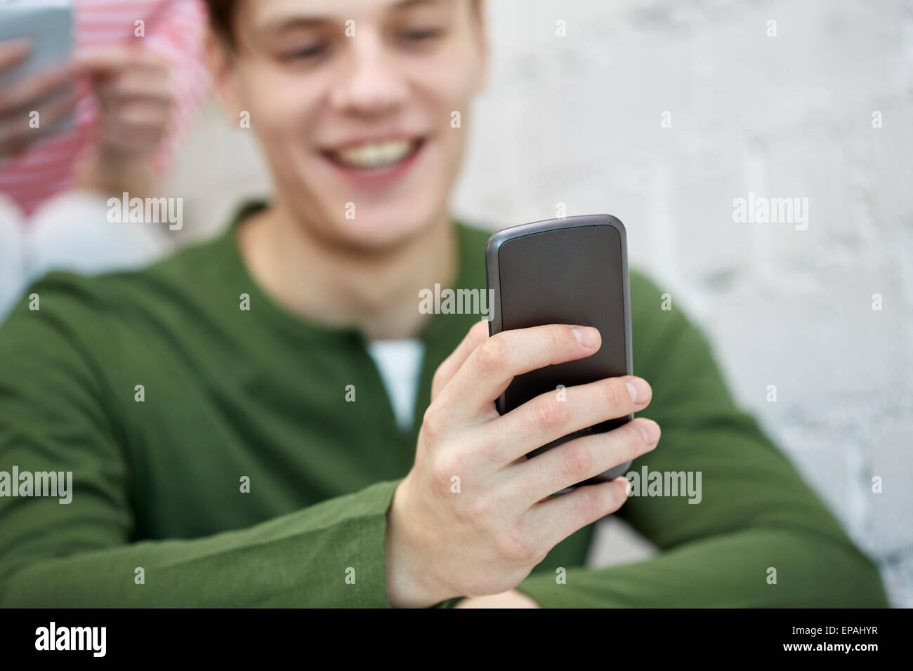 close up of young man with smartphone Stock Photo - Alamy