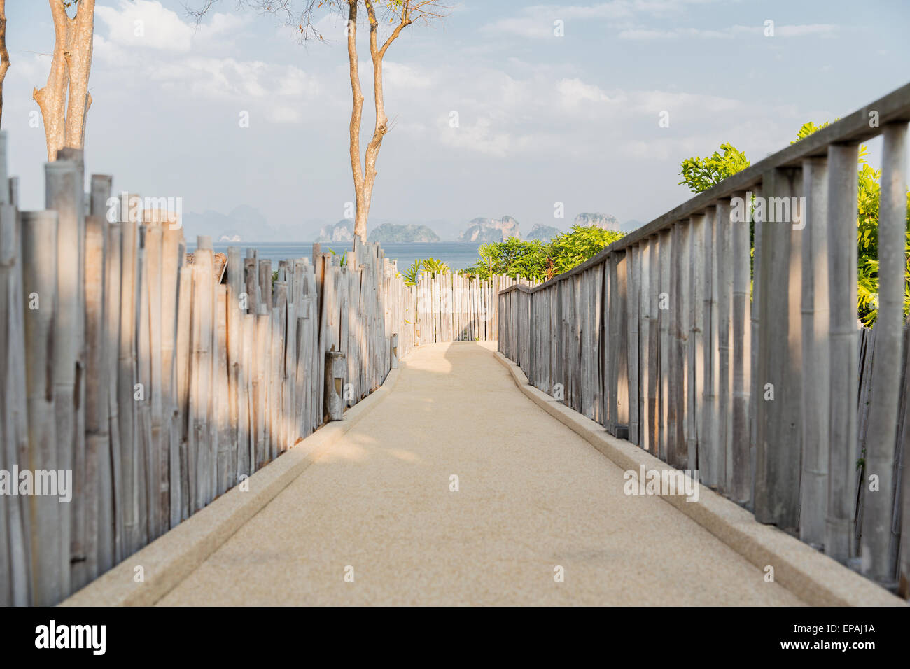 road with fence at seaside Stock Photo - Alamy