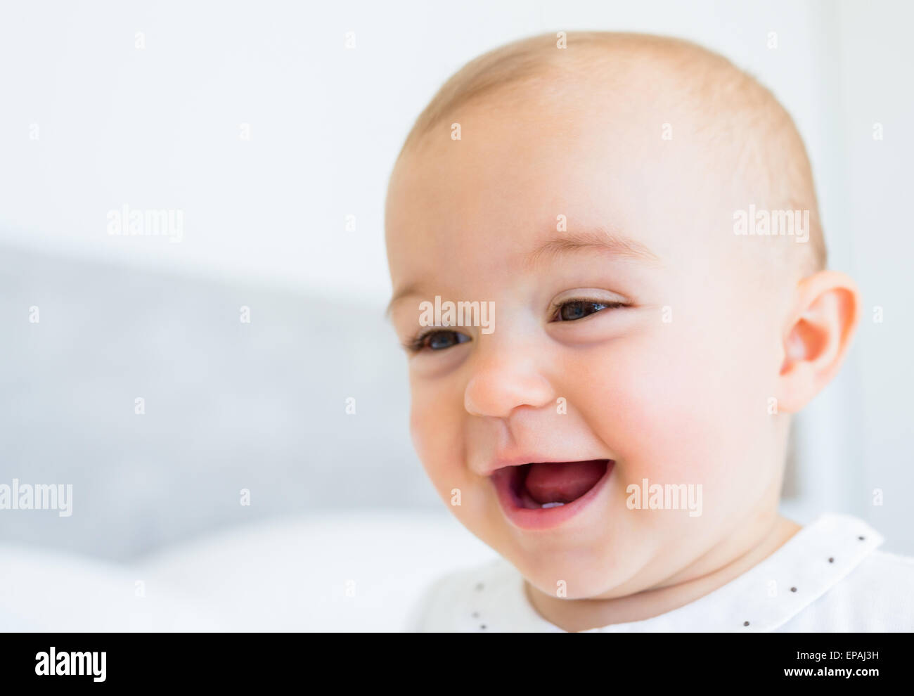 Closeup portrait of a smiling cute baby Stock Photo - Alamy