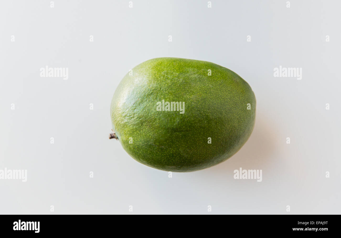 ripe green mango over white Stock Photo - Alamy