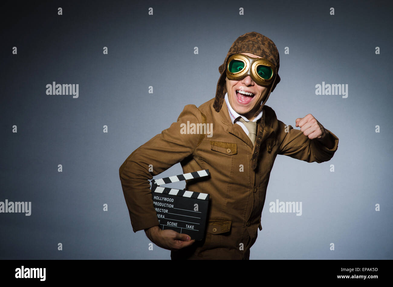 Funny pilot with goggles and helmet Stock Photo - Alamy