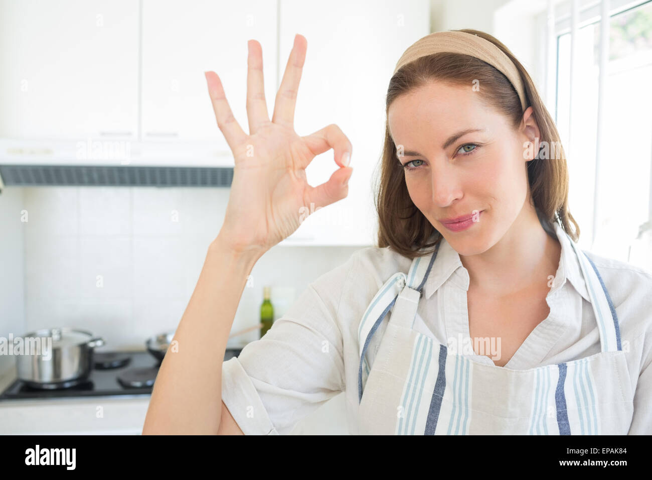 Okay gesture young female home hi-res stock photography and images - Alamy