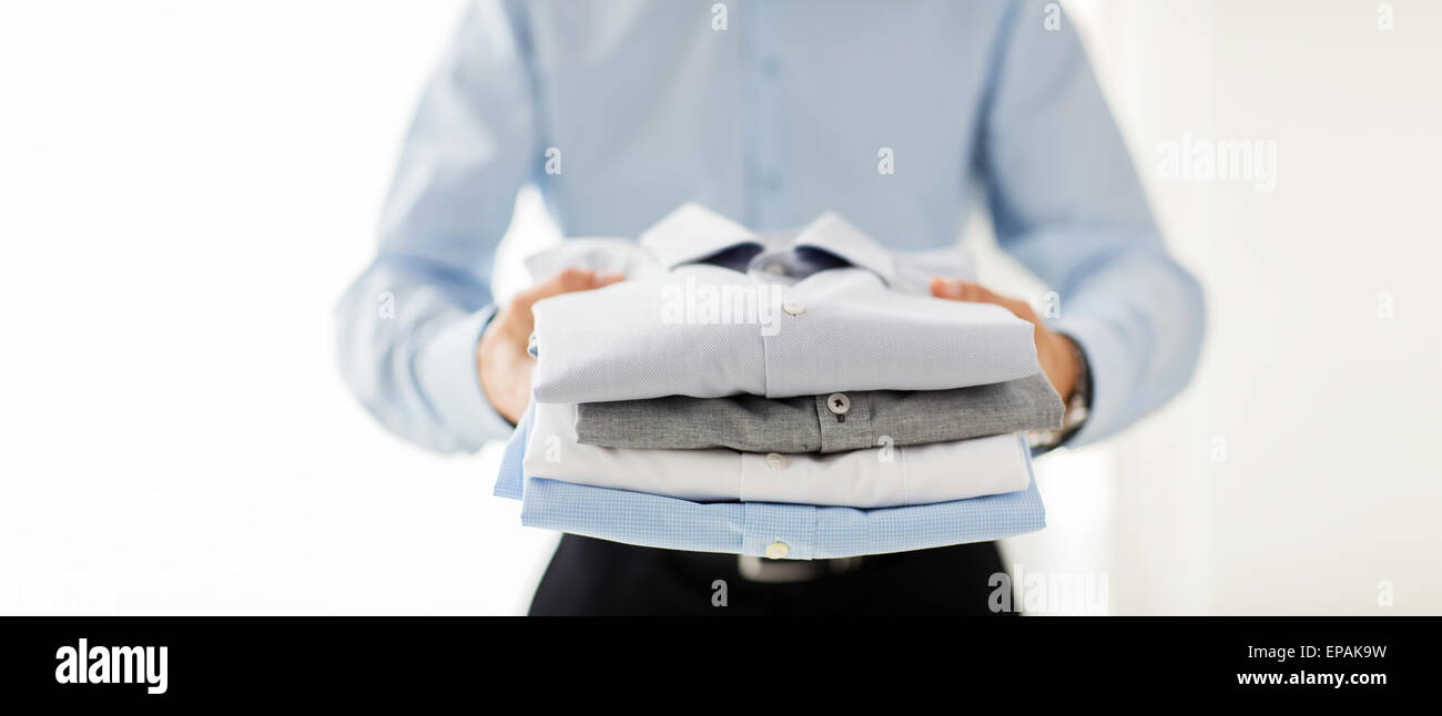 Hands holding cloth hi-res stock photography and images - Alamy