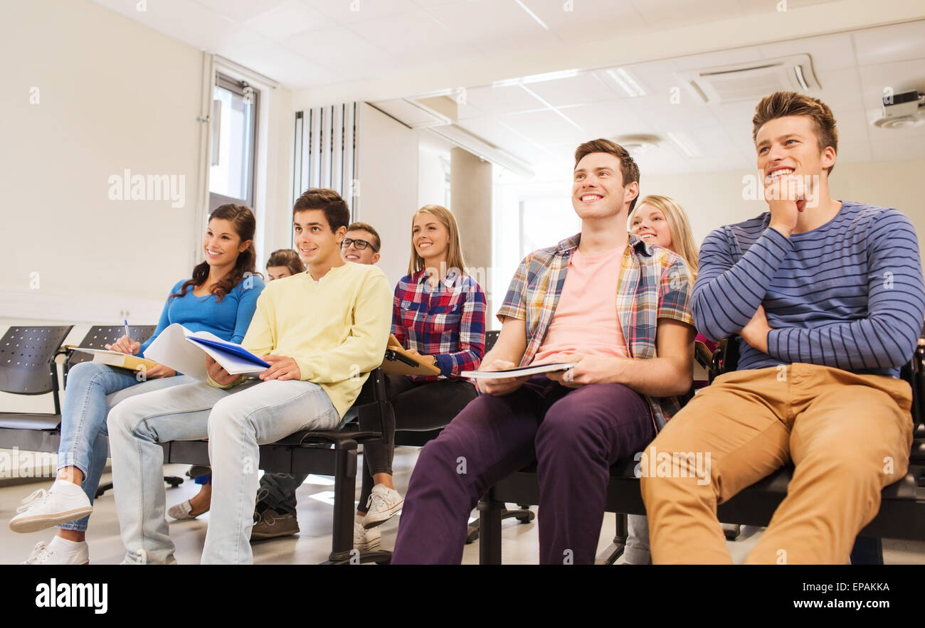 group of smiling students in lecture hall Stock Photo - Alamy