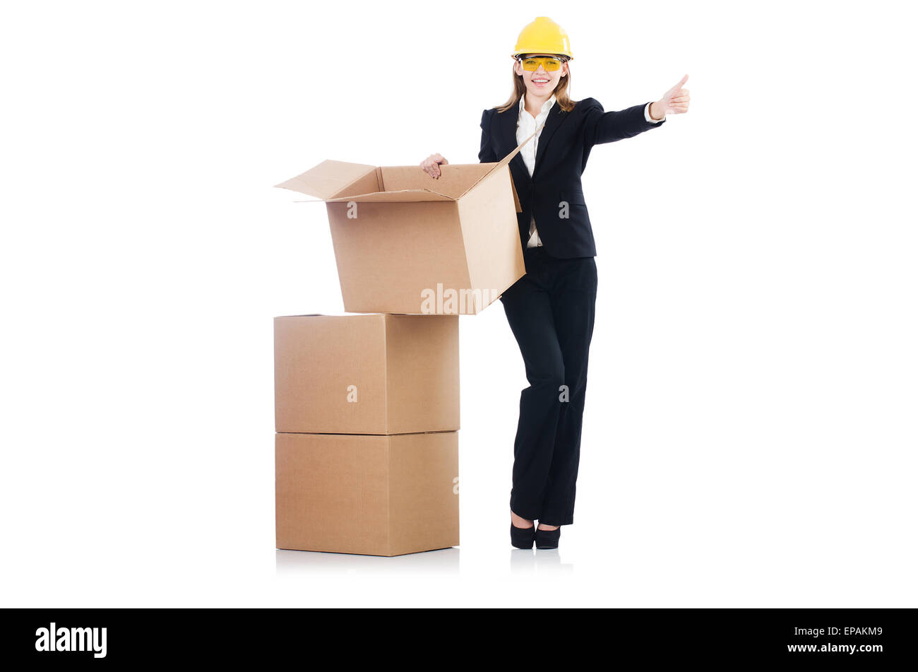 Woman builder with boxes isolated on white Stock Photo - Alamy