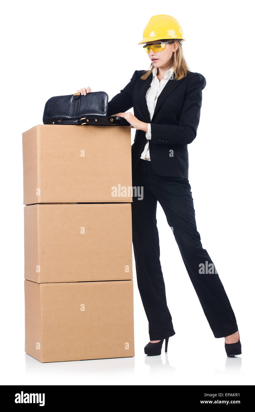 Young builder woman with boxes and bags isolated on white Stock Photo ...
