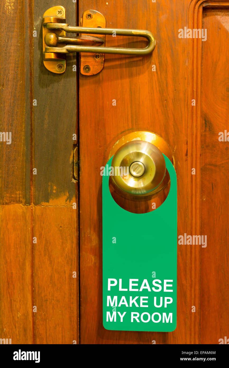 sign on the wood door handle Stock Photo - Alamy