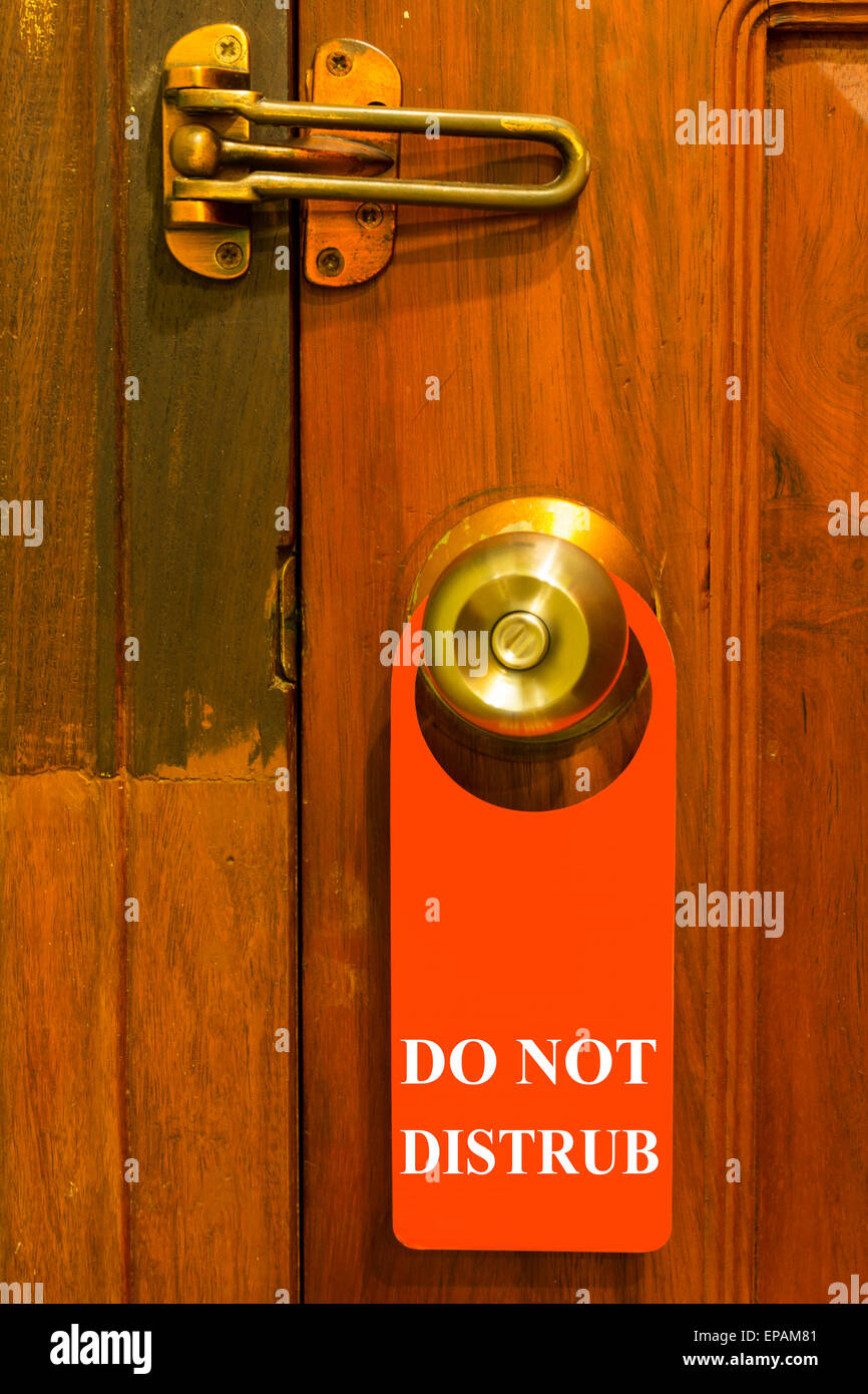 sign on the wood door handle Stock Photo - Alamy