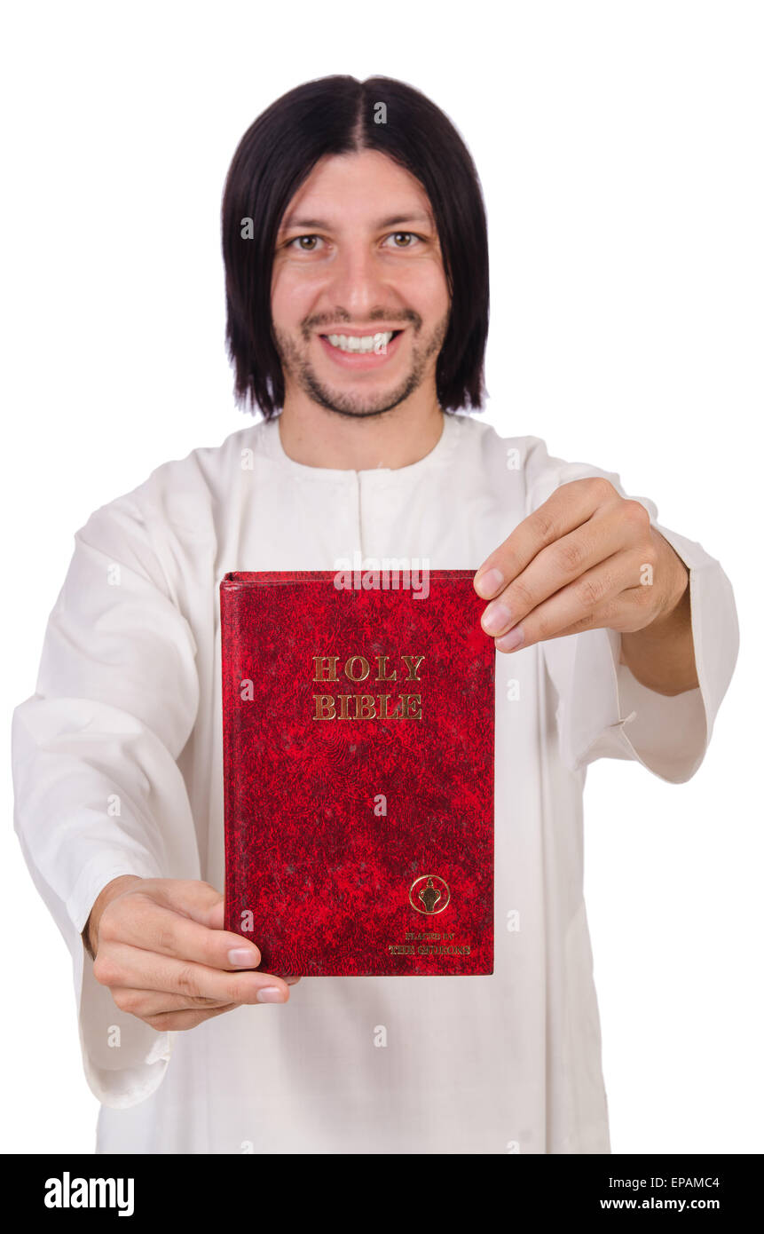 Young priest with bible isolated on white Stock Photo - Alamy
