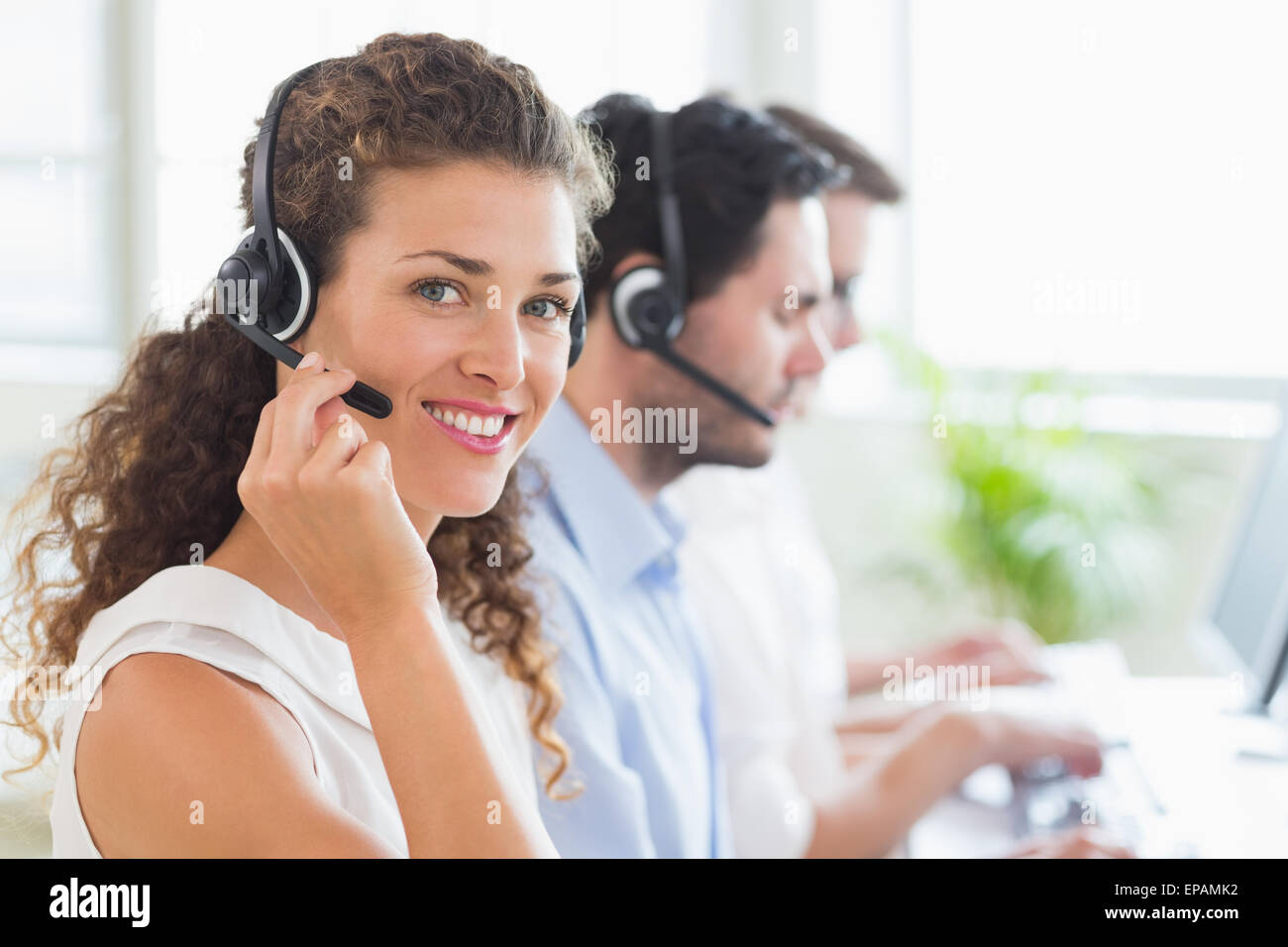 Confident female call center agent Stock Photo - Alamy