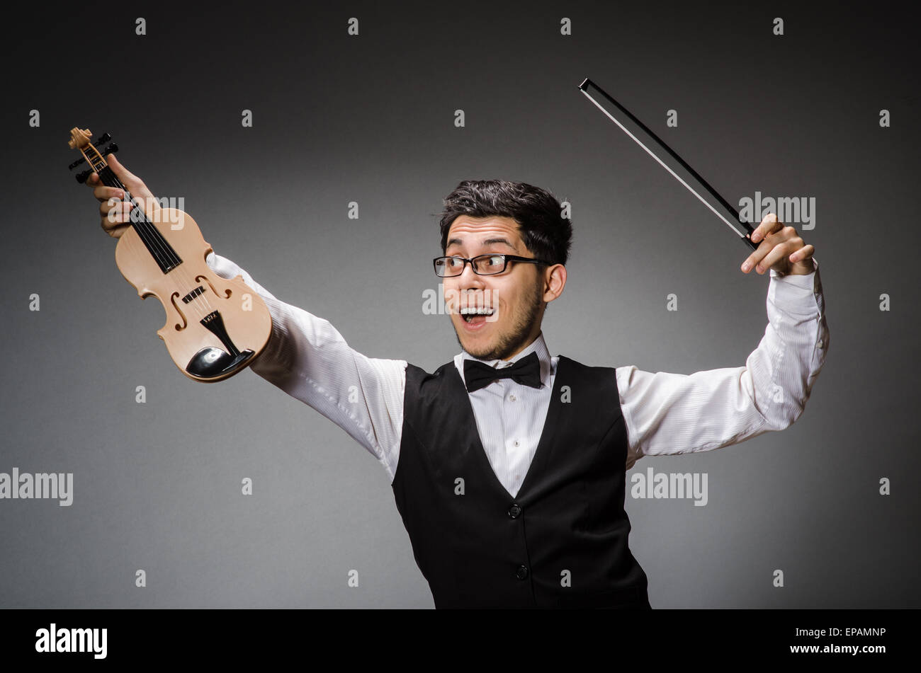 Funny violin player with fiddle Stock Photo - Alamy