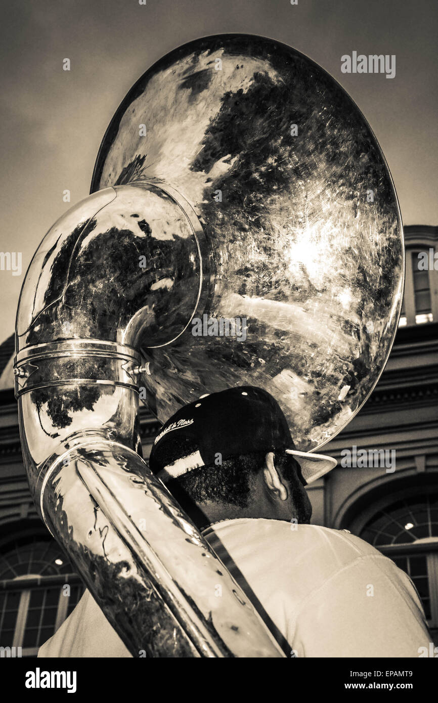 Street musician entertains tourists in Jackson Square with his Tuba in ...