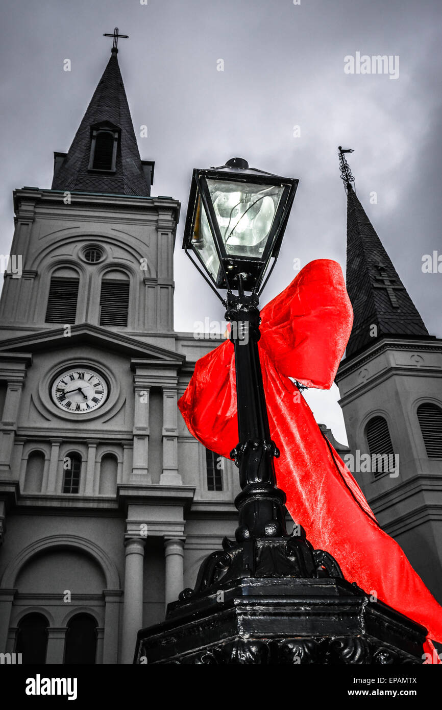 Big Red bows hang from the lamp posts near St. Louis Cathedral, Jackson ...
