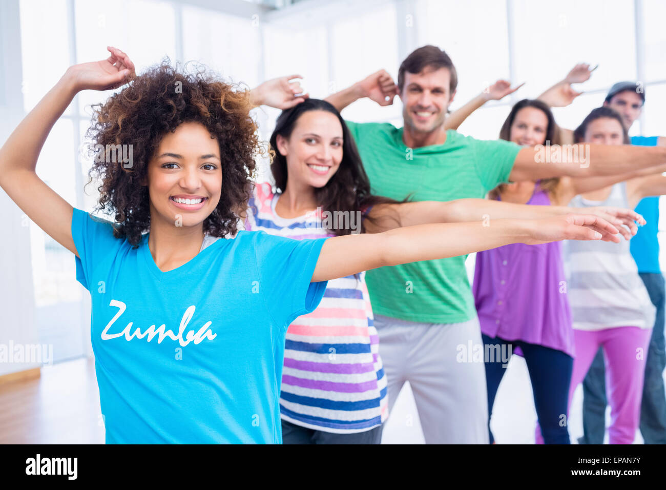 Fitness class and instructor doing pilates exercise Stock Photo - Alamy