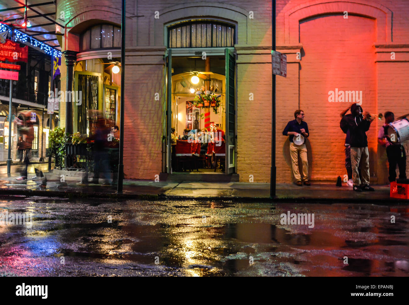 Late night street musicians entertain on a darkened Bourbon Street in ...