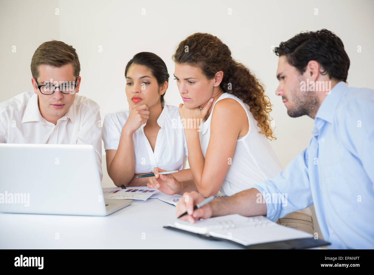 Senior business people using laptop Stock Photo - Alamy