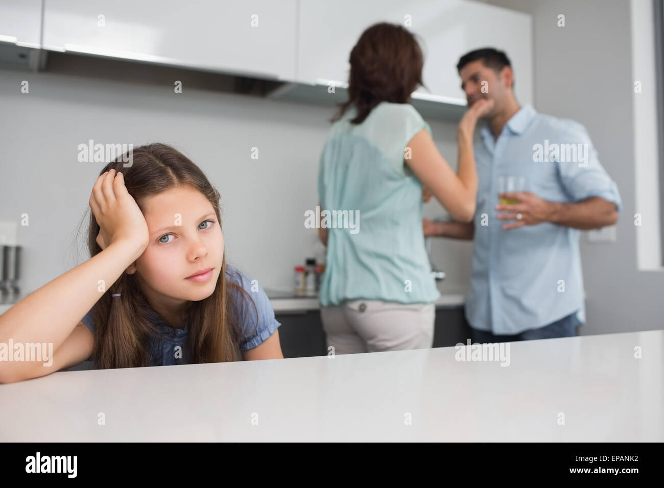 Closeup portrait of a sad girl while parents quarreling Stock Photo - Alamy