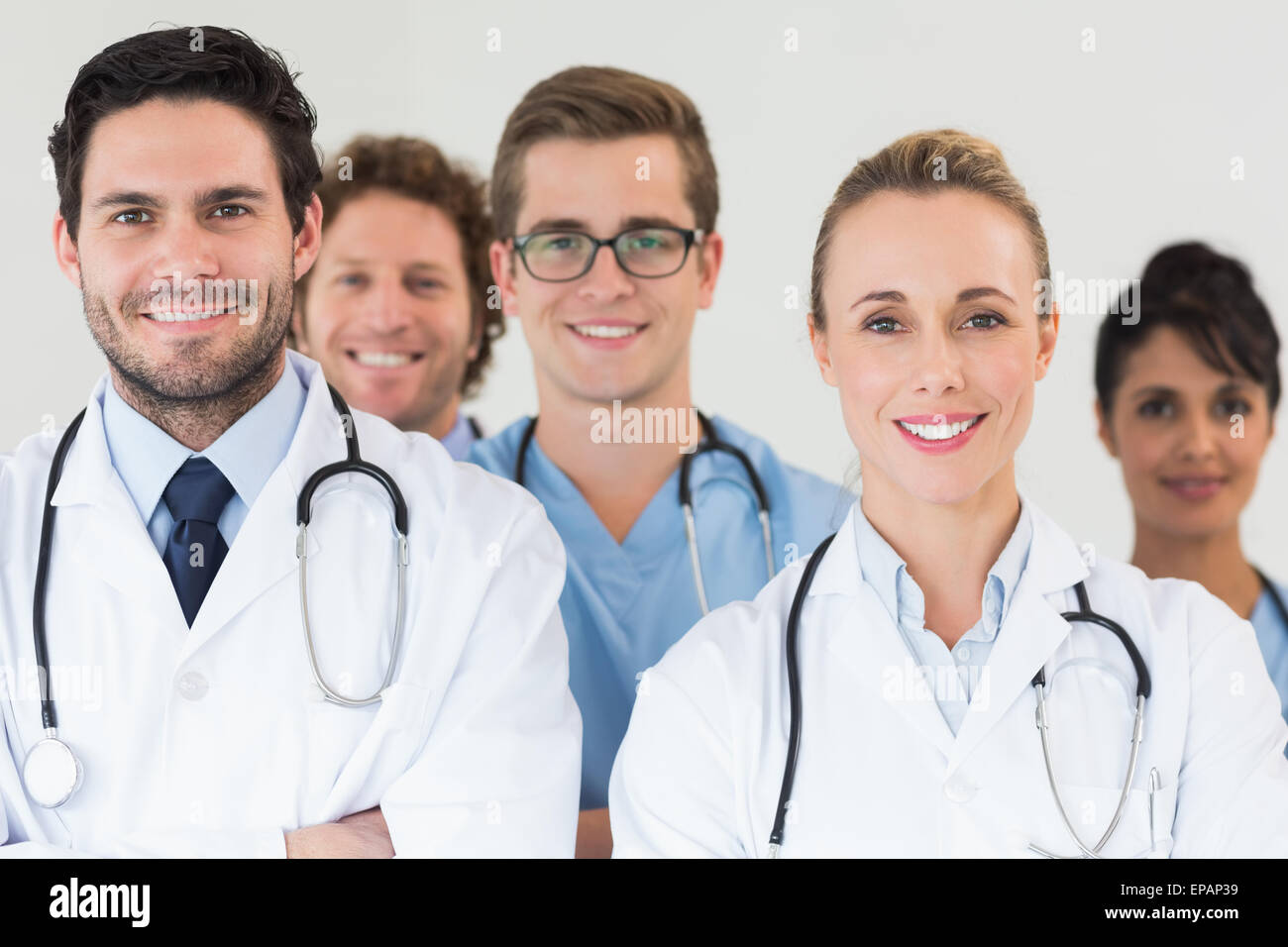 Medical team smiling together Stock Photo - Alamy