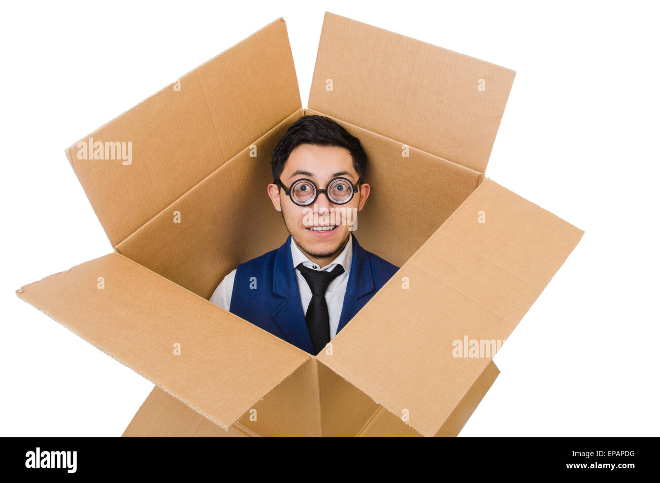 Man in thinking outside the box concept Stock Photo - Alamy