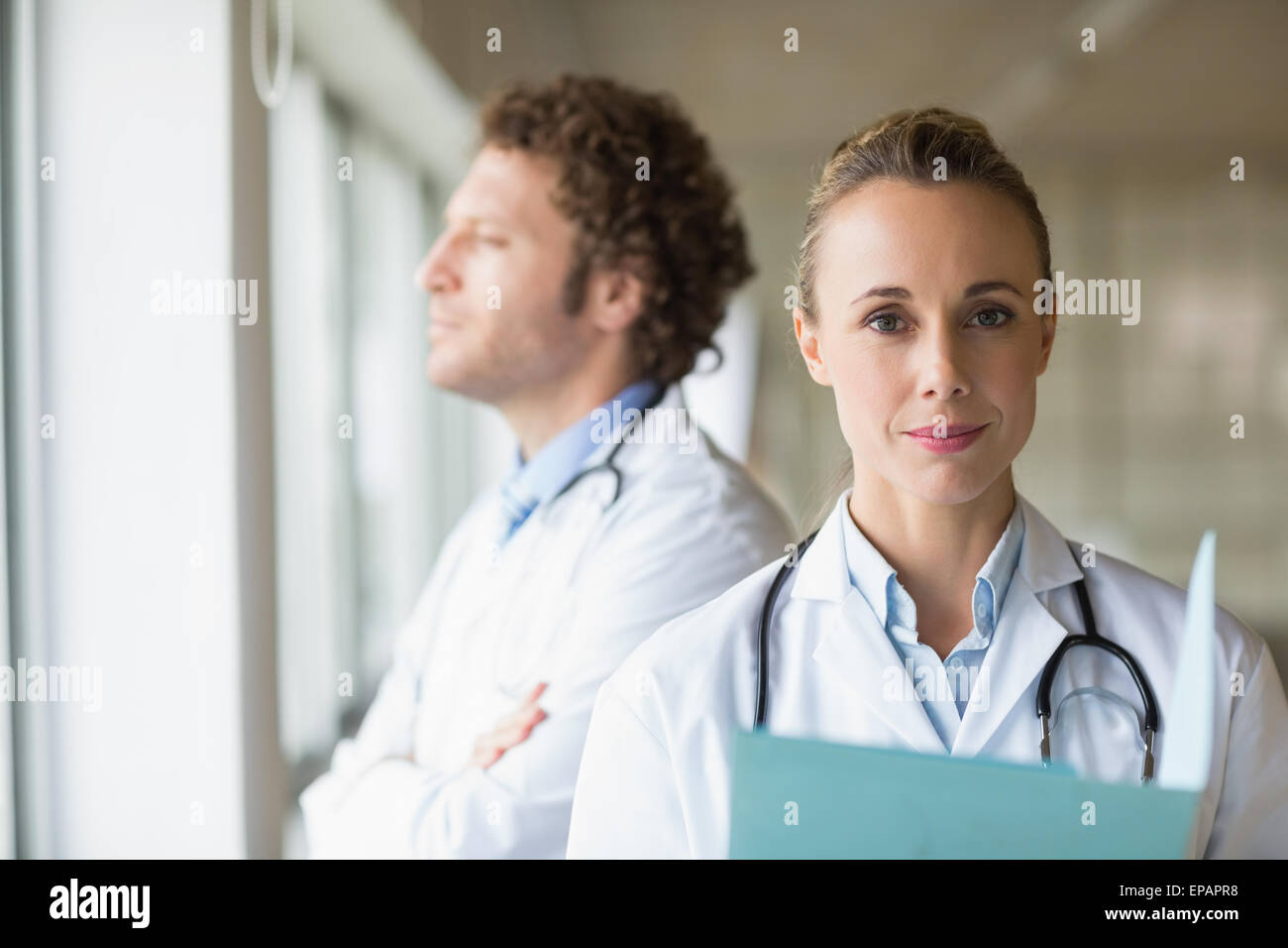 Portrait of confident female doctor Stock Photo - Alamy