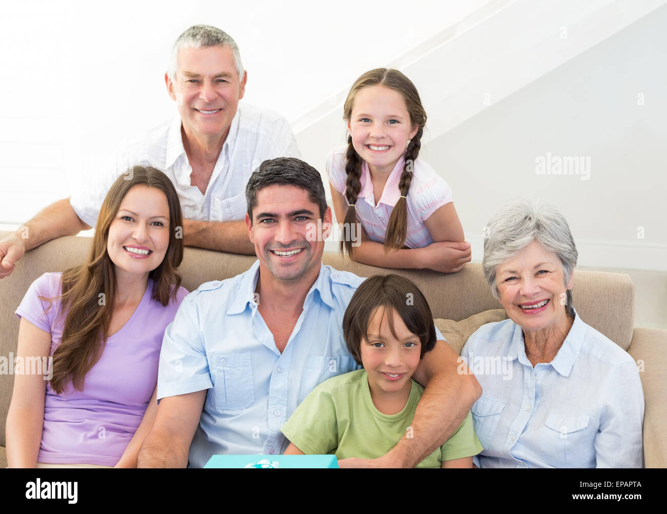 Smiling multigeneration family Stock Photo - Alamy