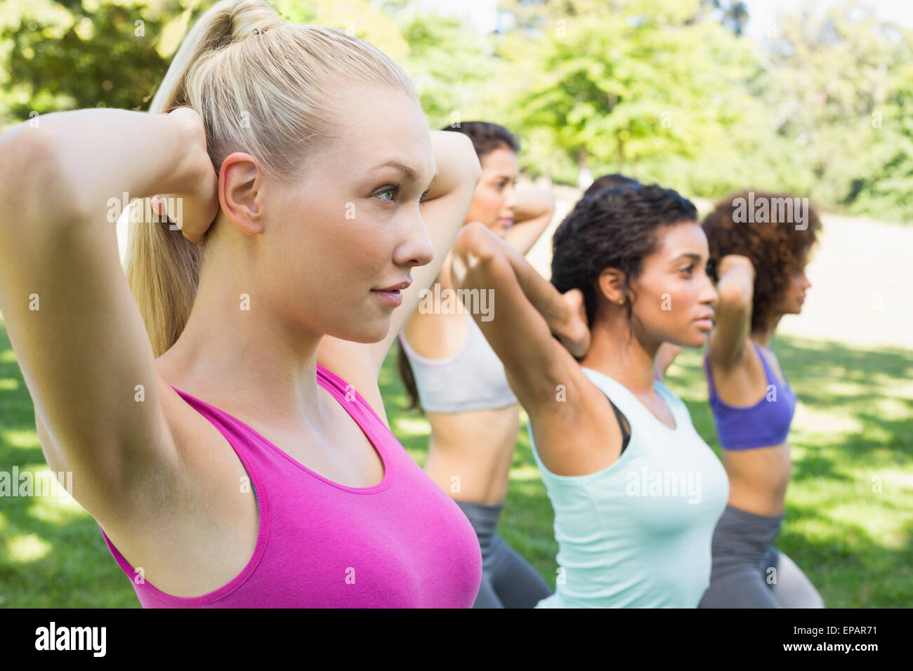 Women exercising in park Stock Photo - Alamy