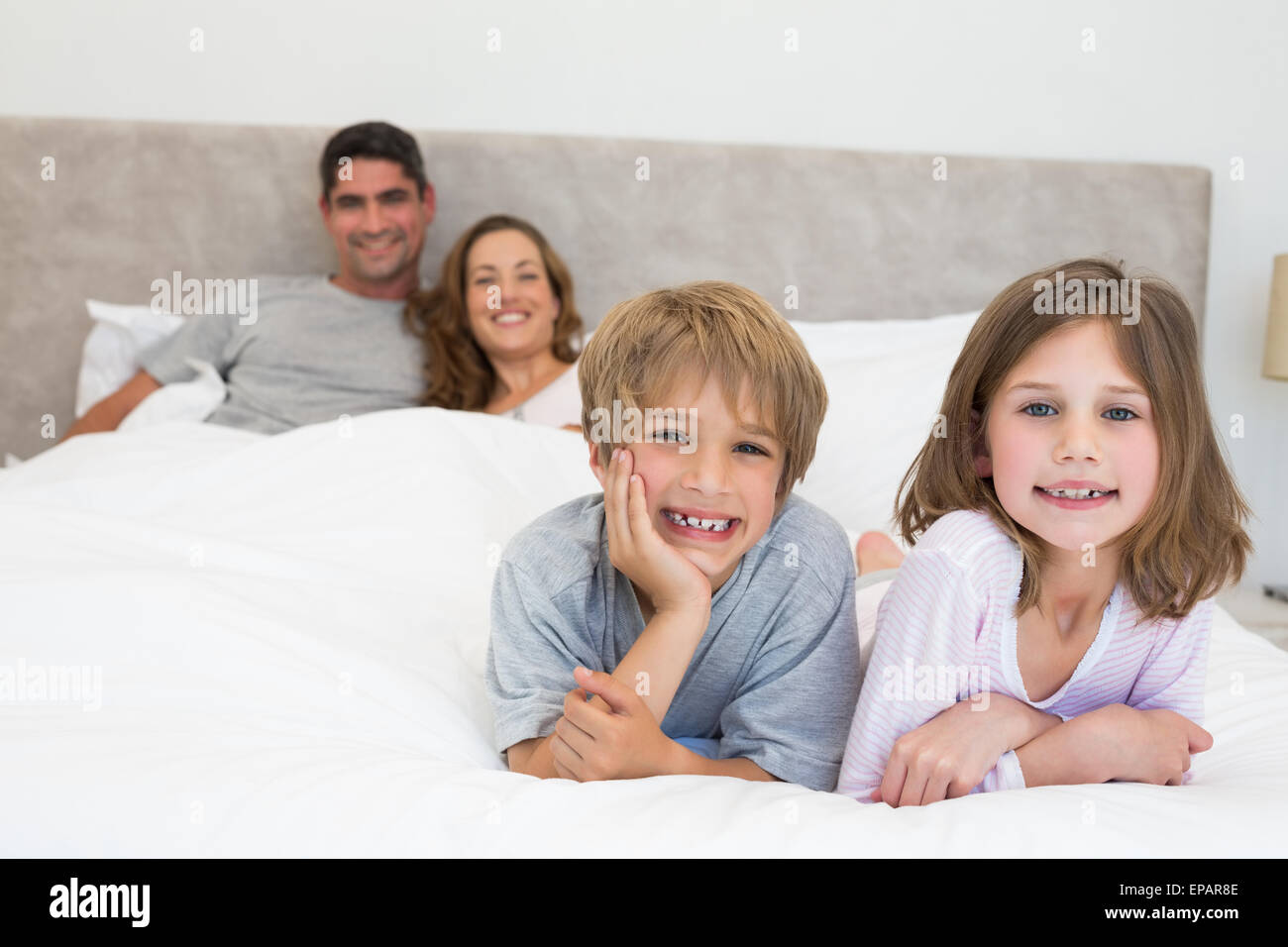 Portrait of happy siblings Stock Photo - Alamy