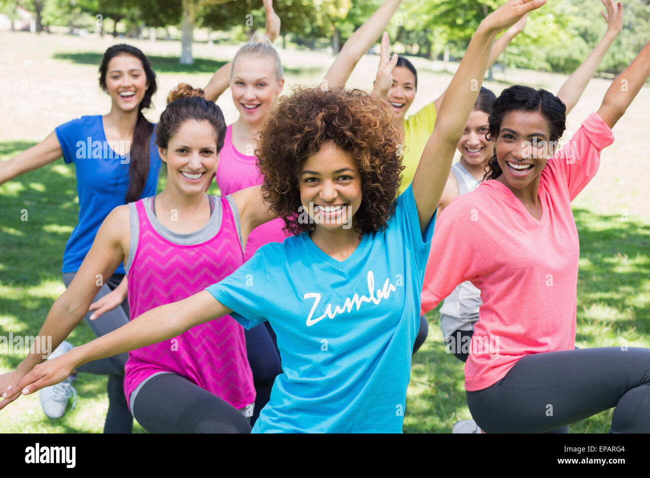 Women performing fitness dance in park Stock Photo - Alamy