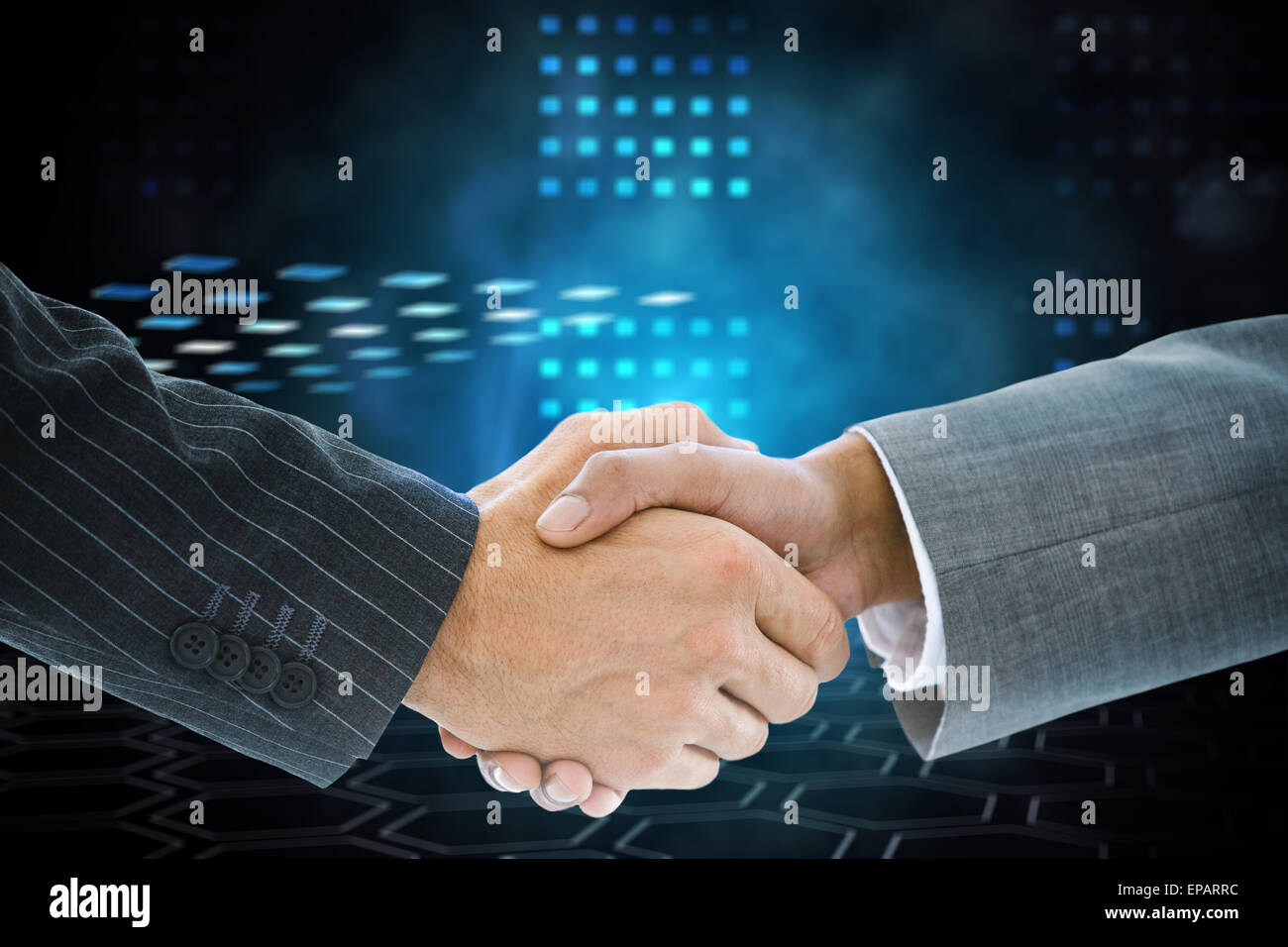 Composite image of business handshake Stock Photo - Alamy