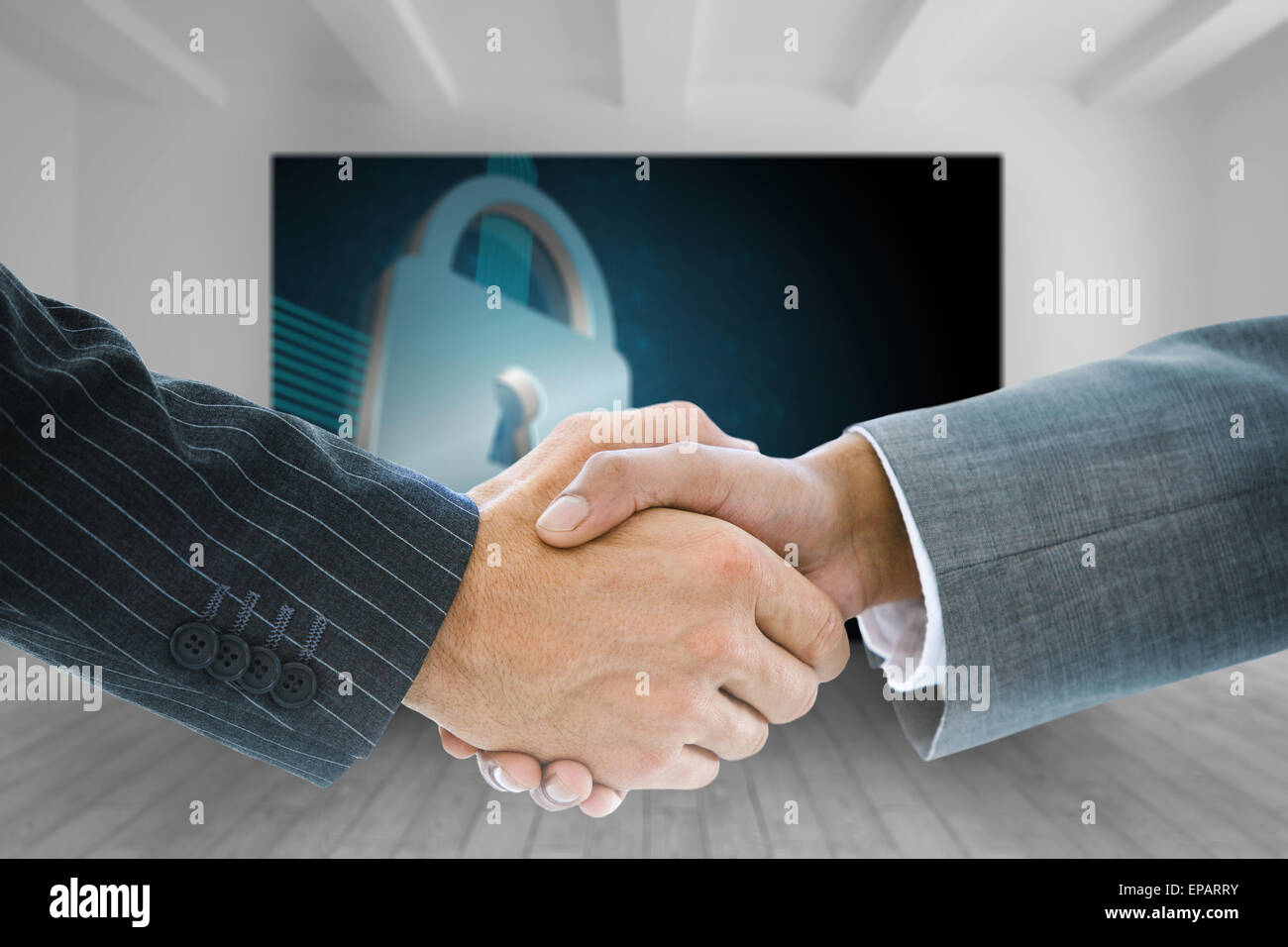Composite image of business handshake Stock Photo - Alamy