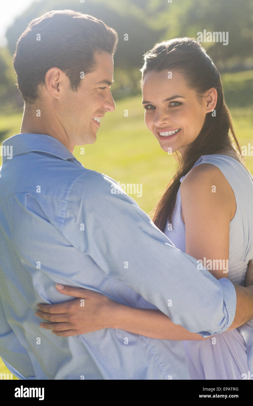 Portrait of a loving and happy couple at park Stock Photo - Alamy Portrait of a loving and happy couple at park Stock Photo - Alamy