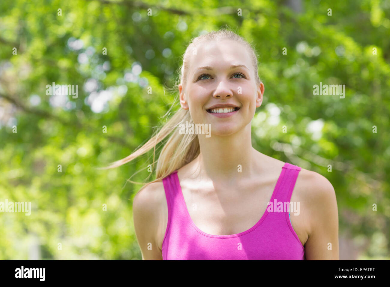 Close-up of a healthy woman in sports bra in park Stock Photo - Alamy