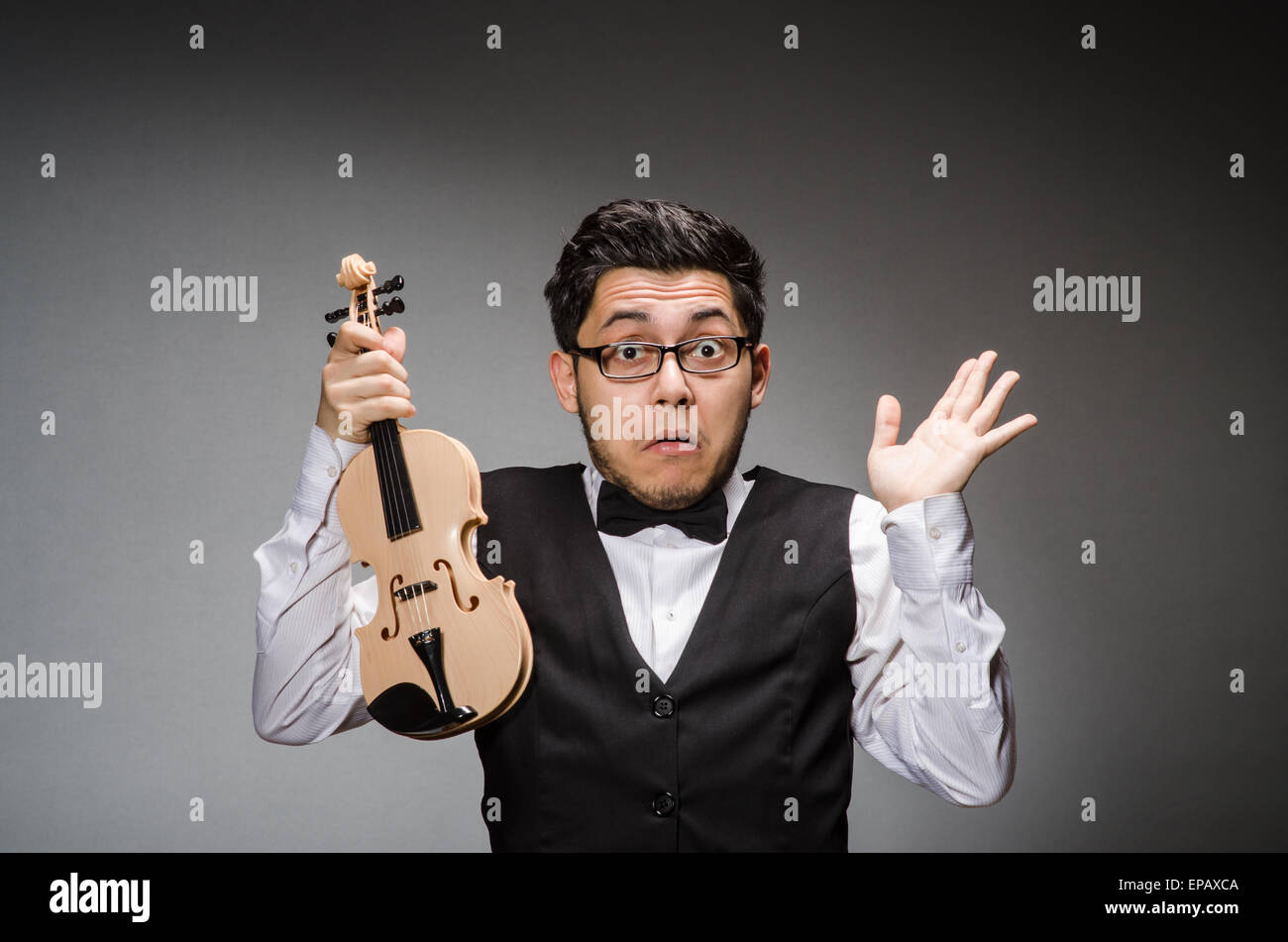 Funny violin player with fiddle Stock Photo - Alamy