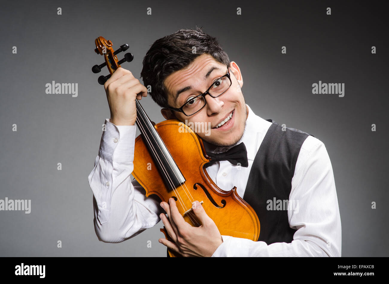 Funny violin player with fiddle Stock Photo - Alamy