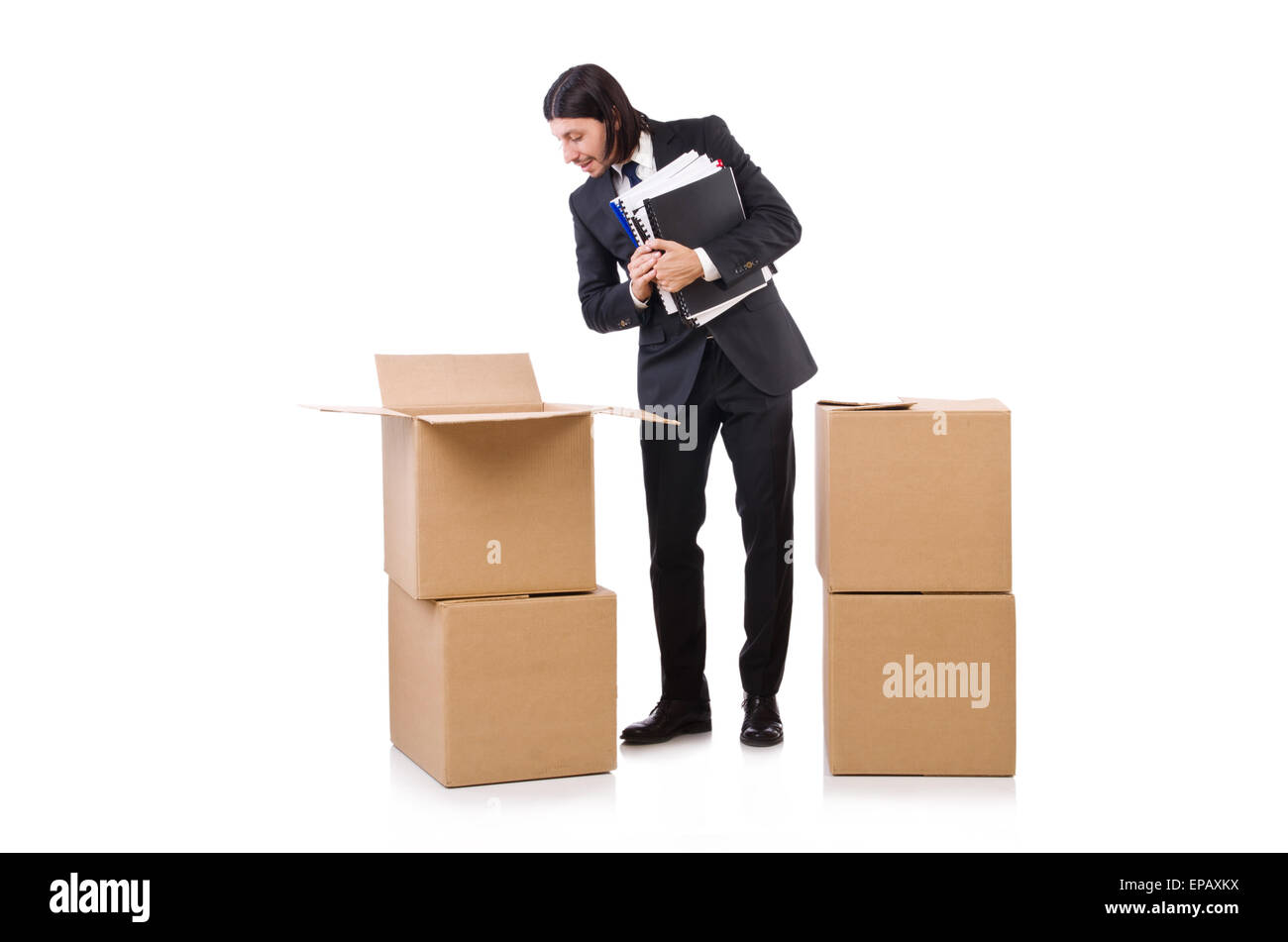 Man with boxes full of work Stock Photo - Alamy