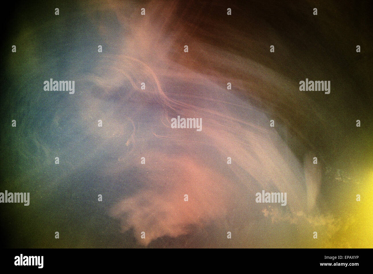 Abstract film texture background with heavy grain, dust and light leak ...