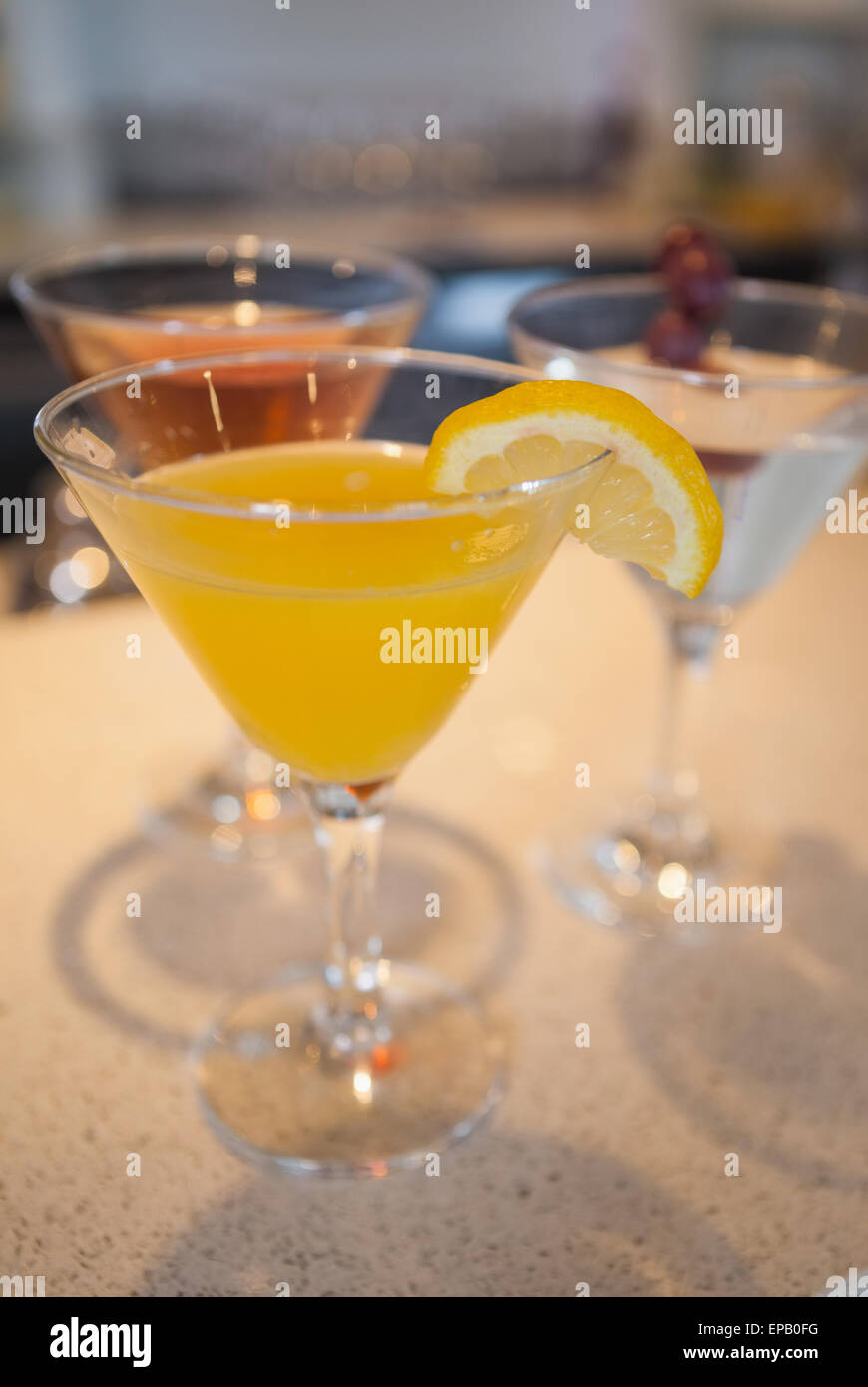 Three cocktails high angle view Stock Photo - Alamy