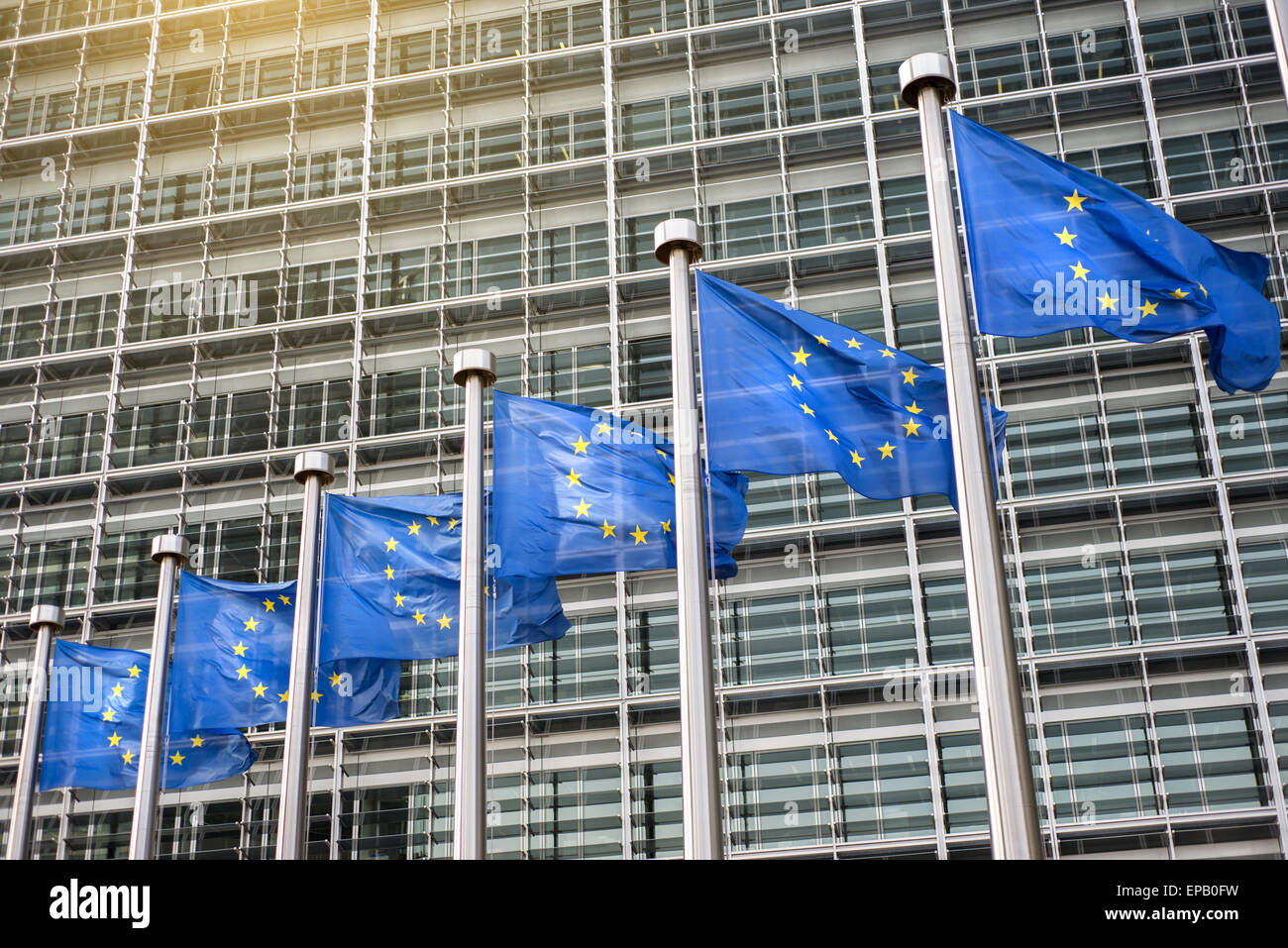 European Union flags in front of the Berlaymont Stock Photo - Alamy