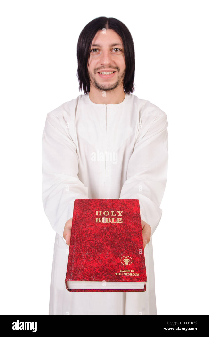 Young priest with bible isolated on white Stock Photo - Alamy