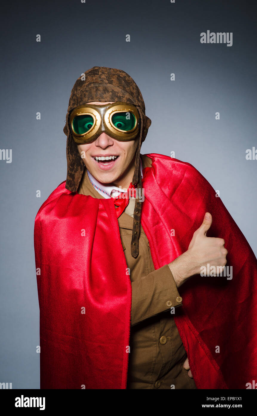 Funny pilot with goggles and helmet Stock Photo - Alamy