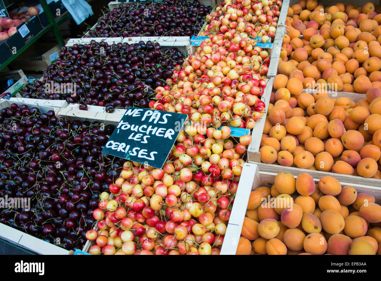 Cherries and appricots in market Stock Photo - Alamy