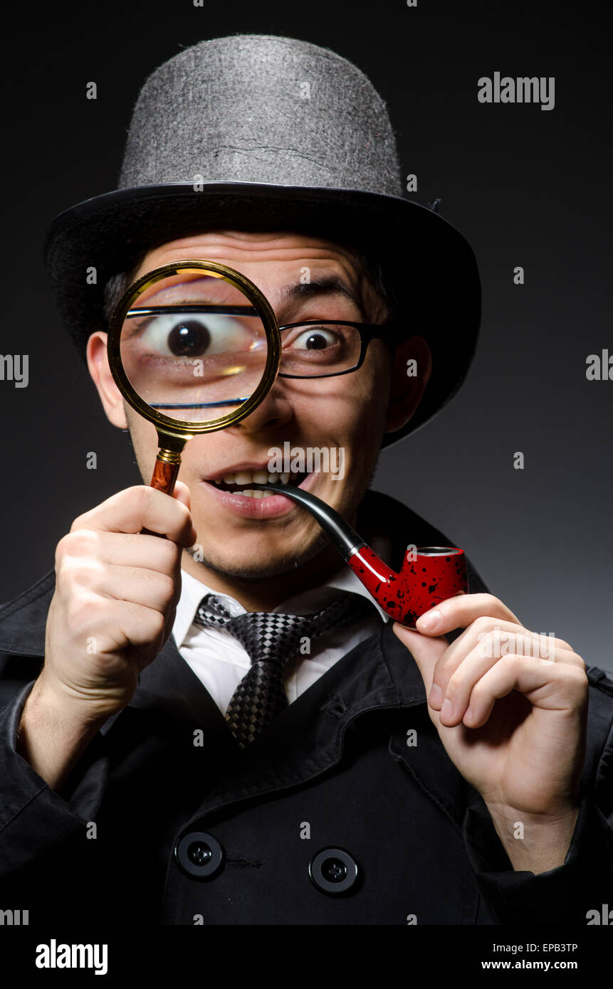 Funny detective with pipe and hat Stock Photo - Alamy