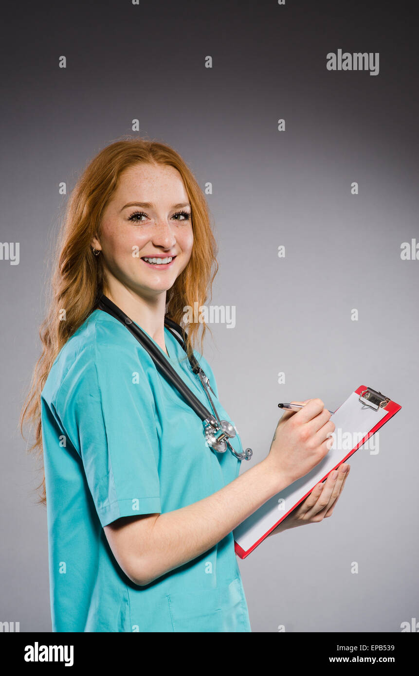 Woman doctor with paper notepad Stock Photo - Alamy