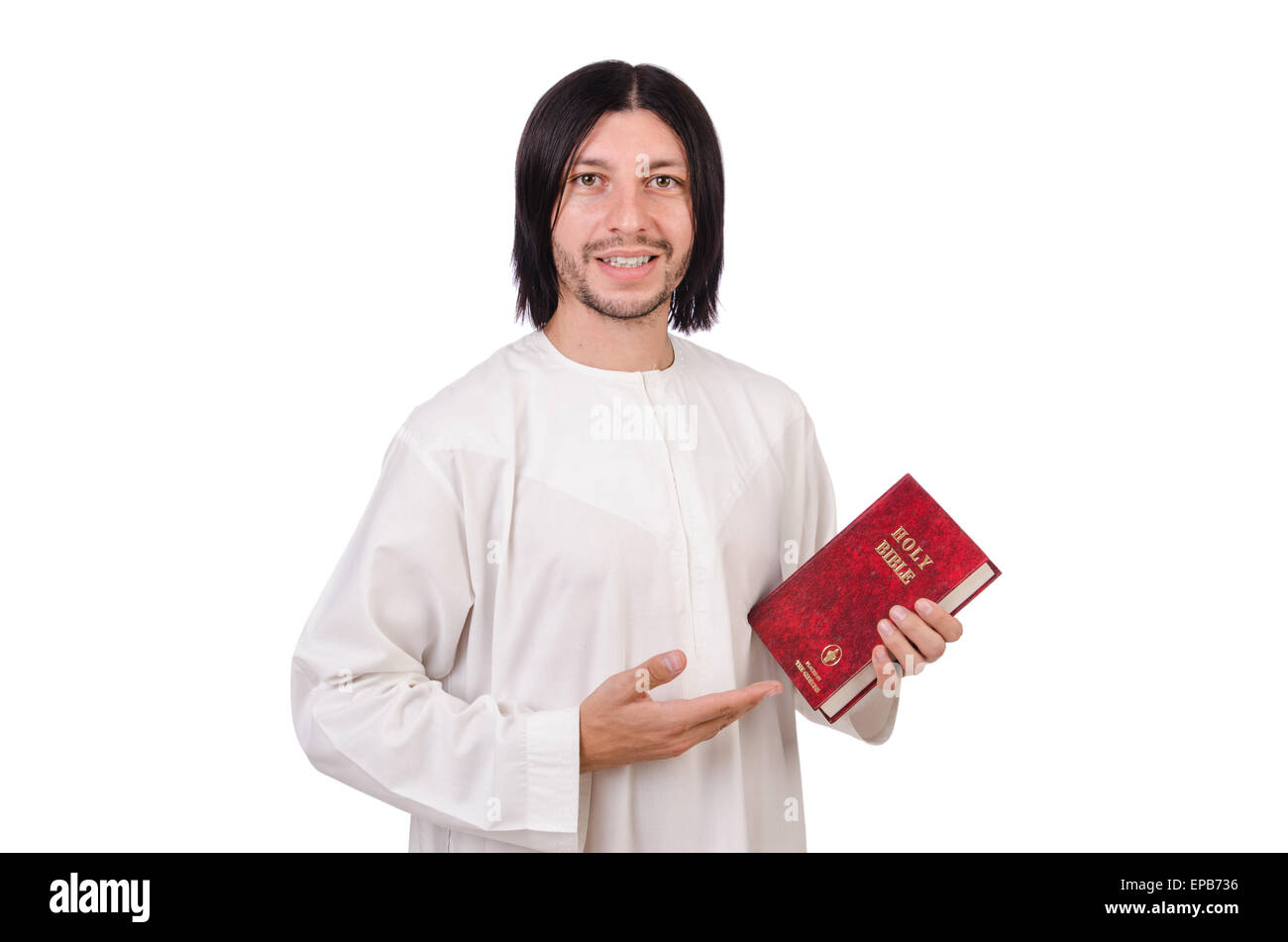 Young priest with bible isolated on white Stock Photo - Alamy