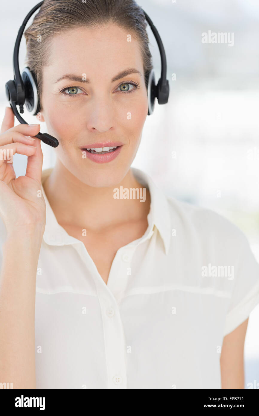 Close-up of a beautiful female executive with headset Stock Photo - Alamy