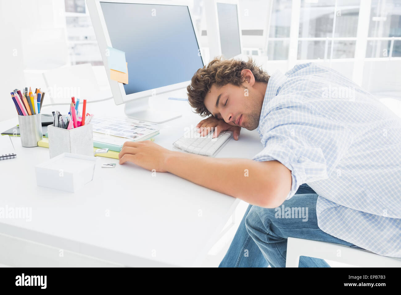 Man sleeping keyboard in computer hi-res stock photography and images ...