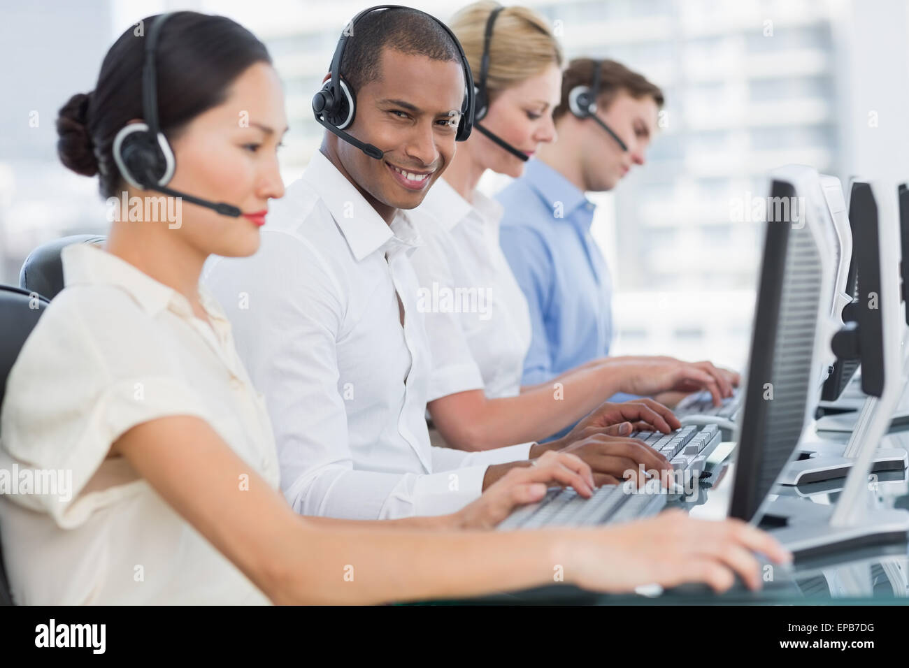 Corporate woman typing office headset hi-res stock photography and ...