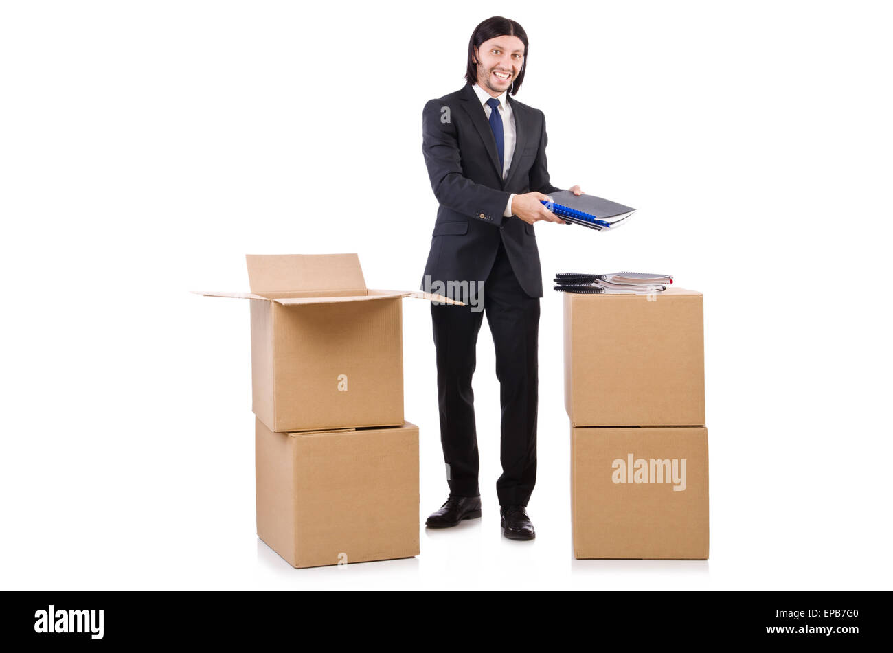 Man with boxes full of work Stock Photo - Alamy