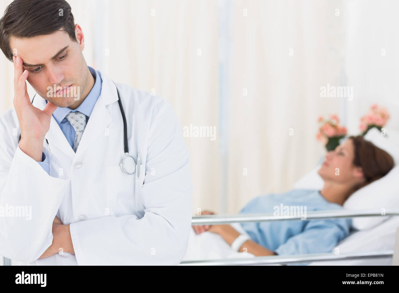 Worried doctor with patient in hospital Stock Photo - Alamy